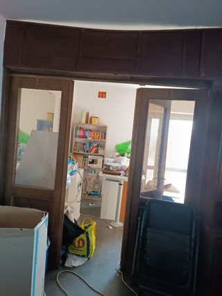 Porta legno a tre e due ante