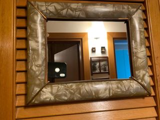 cornice con specchio
